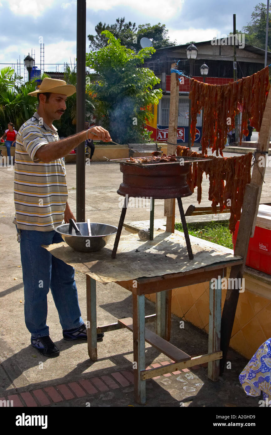 Roadside grilled meat vendor Stock Photo - Alamy