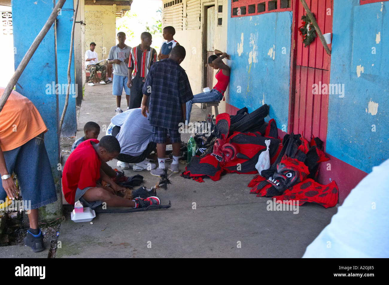 Congo culture men preparing their costumes for the biannual congos and ...