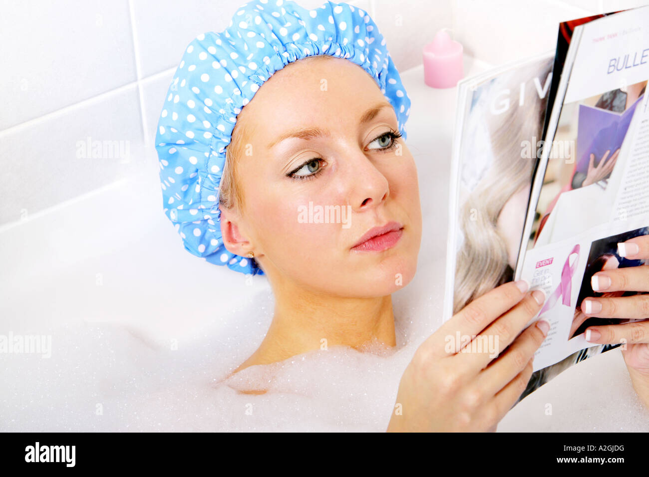 Woman reading magazine in bath hi-res stock photography and images - Alamy