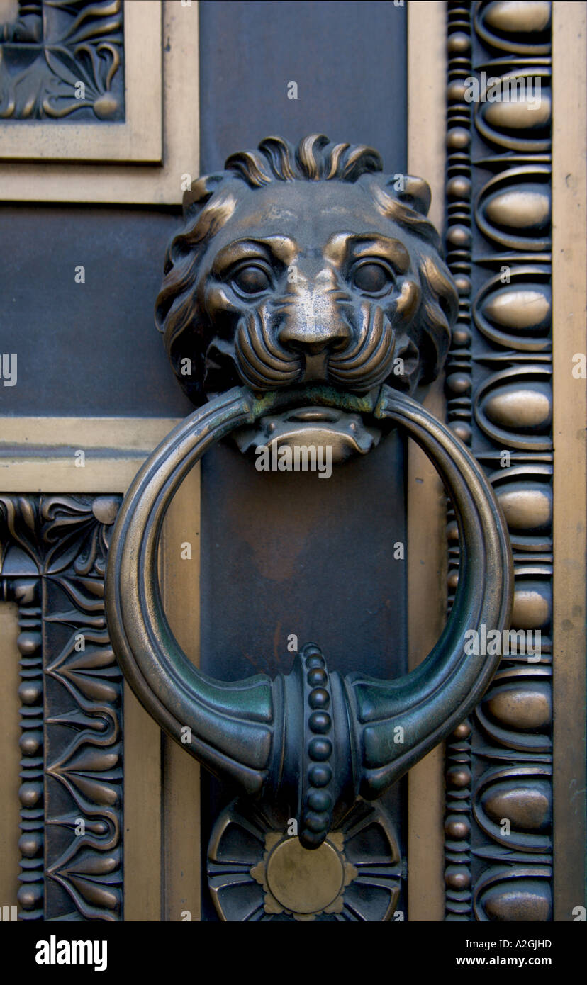 BALTIMORE, MARYLAND. USA. Detail, lion headed door handle on door of ...