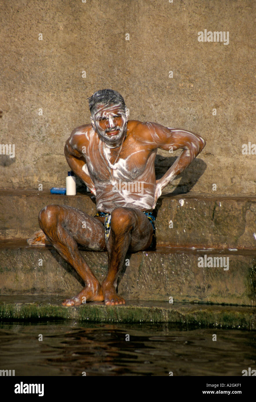 Man washing by river Ganges India Stock Photo - Alamy
