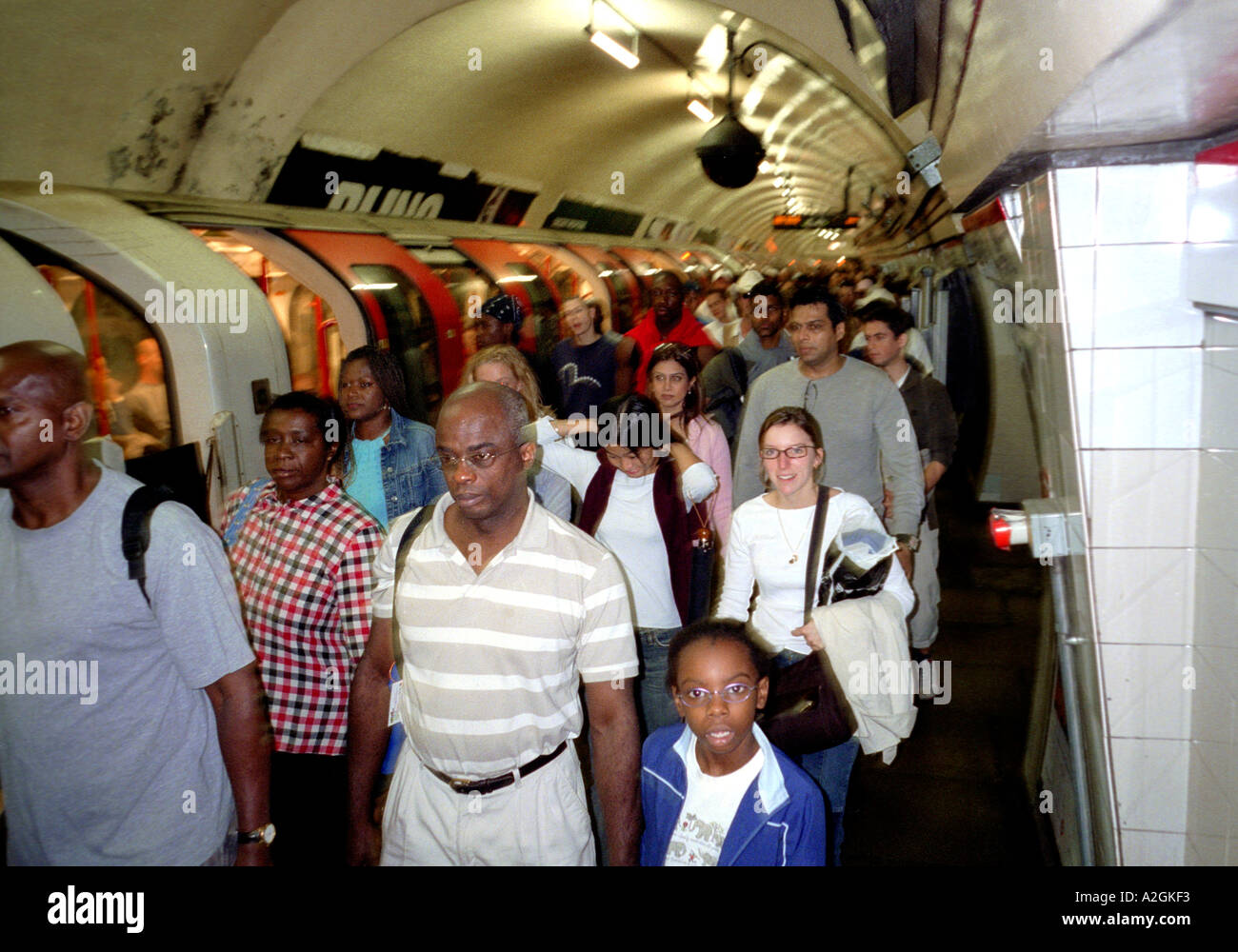 People crowding of London underground at rush hour Stock Photo - Alamy