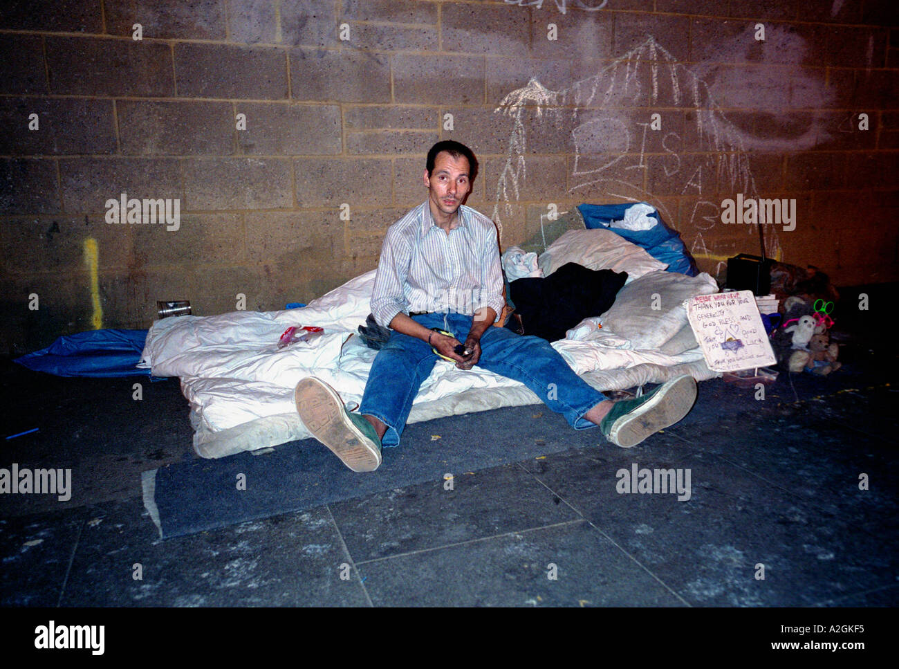 Homeless man sleeping in the underpass by South bank Stock Photo - Alamy