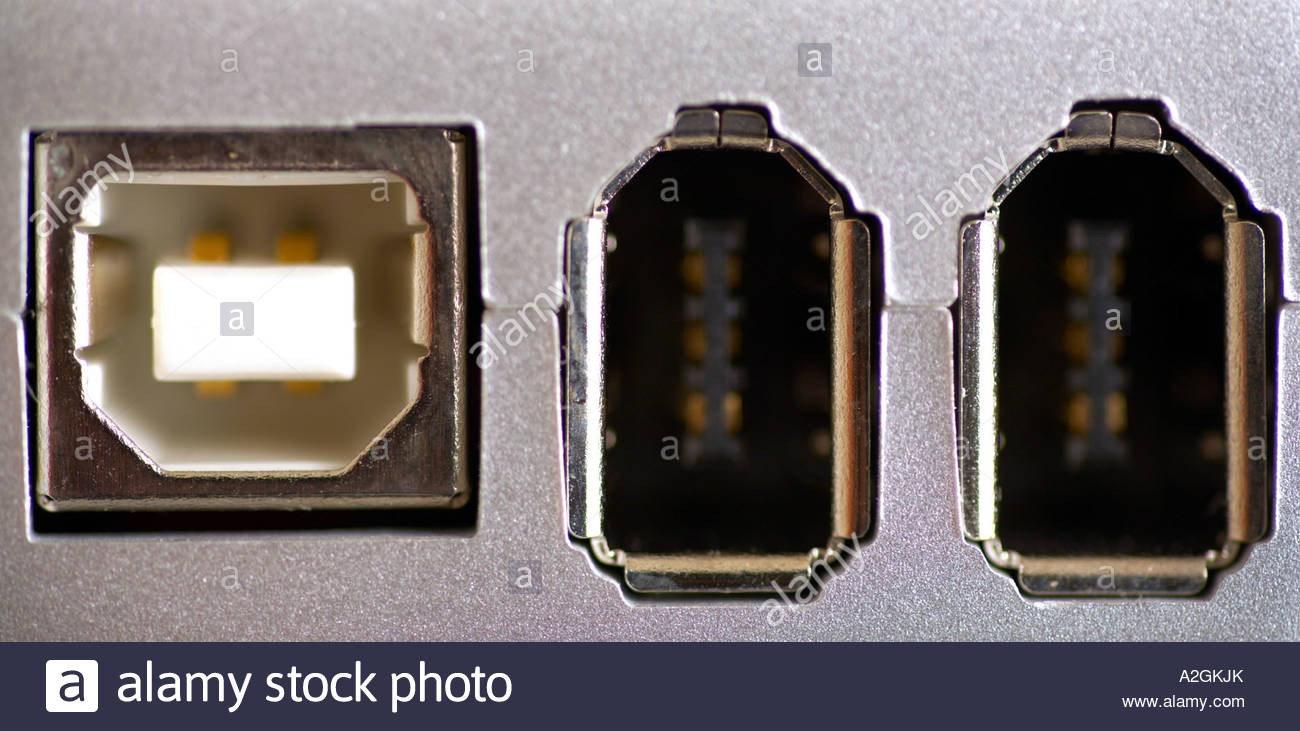 Two firewire and one USB port Stock Photo - Alamy