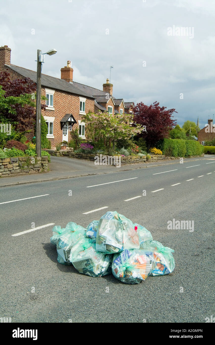 Binbags awaiting collection in a Cheshire village of Ashton Hayes near ...