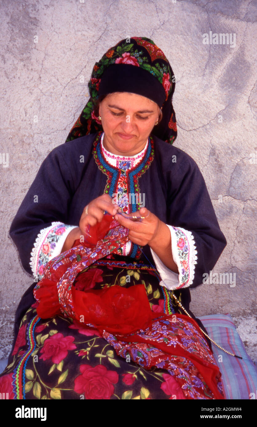 Greek woman seated doing her knitting hi-res stock photography and ...