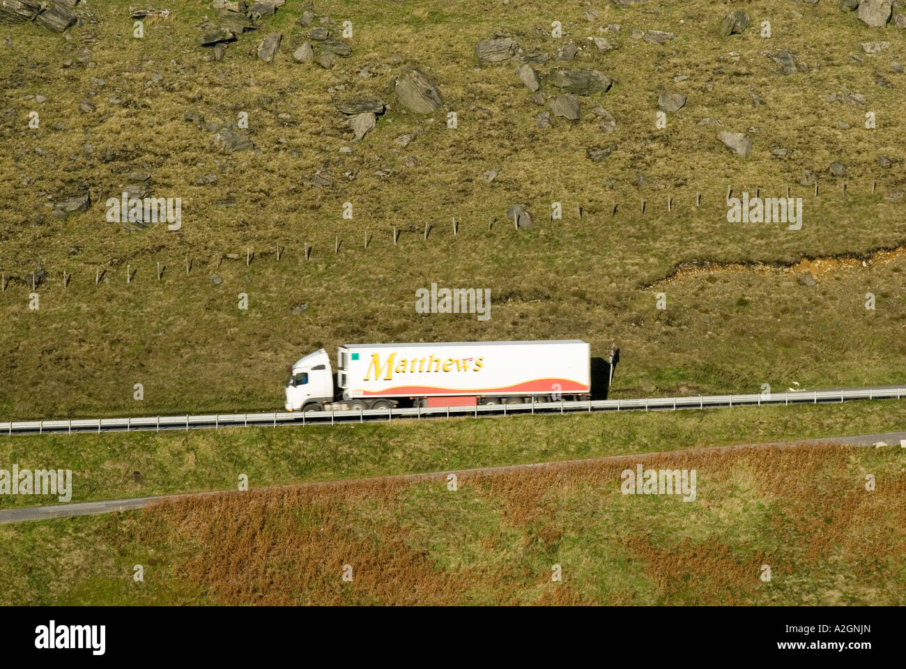 Traffic on the A628 route crossing the Woodhead Pass in the Longdendale ...