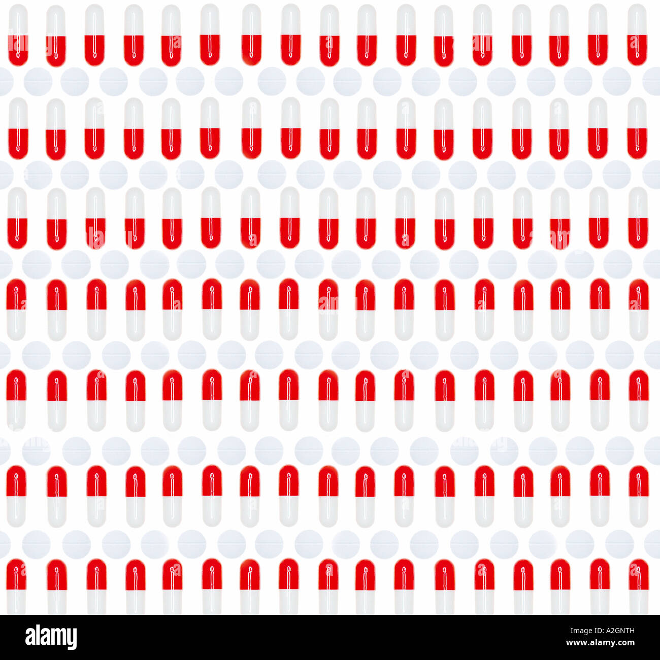 Pills arranged in a pattern Stock Photo - Alamy