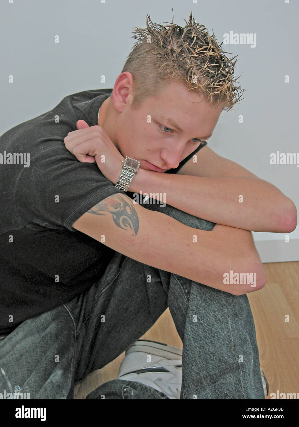 Teenaged boy unhappy hi-res stock photography and images - Alamy