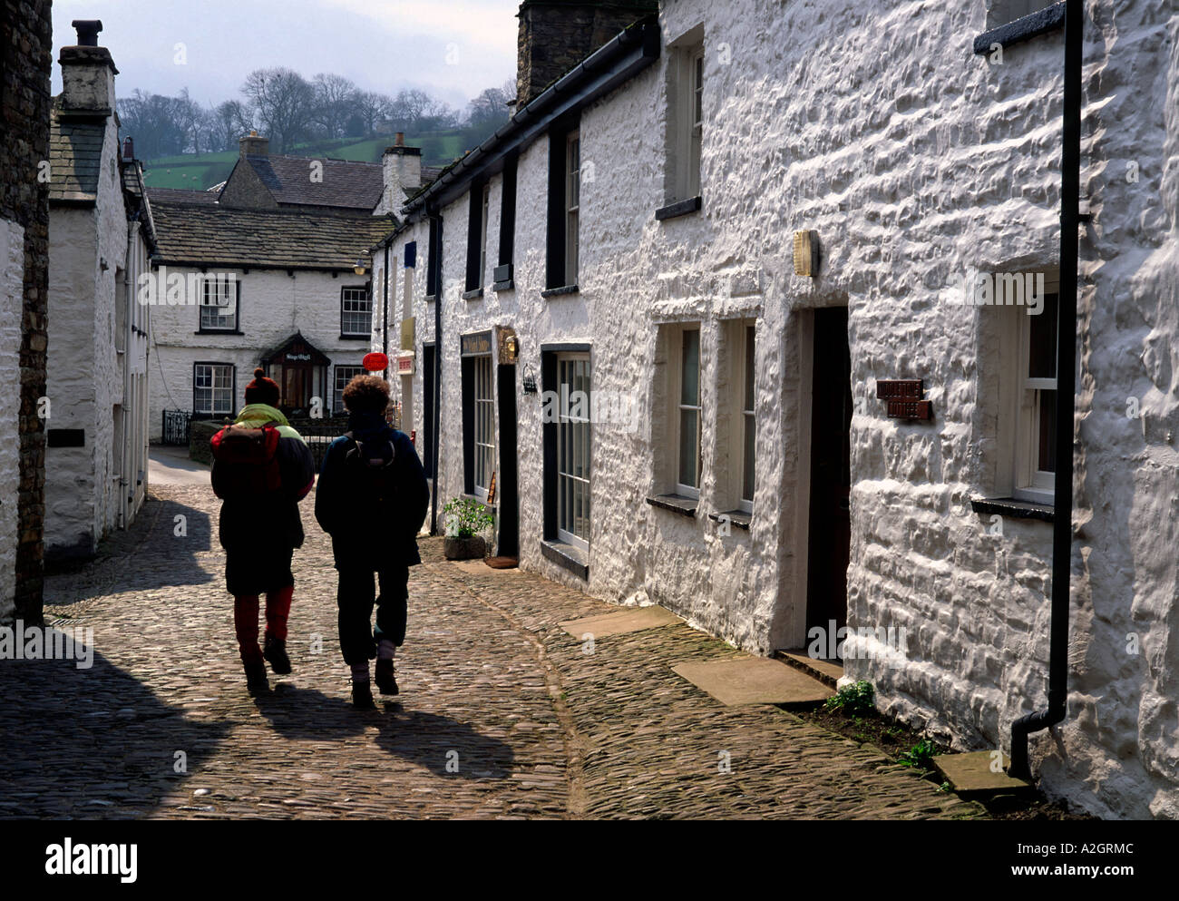 Walkers in Dent village in the Yorkshire Dales england uk Stock Photo ...