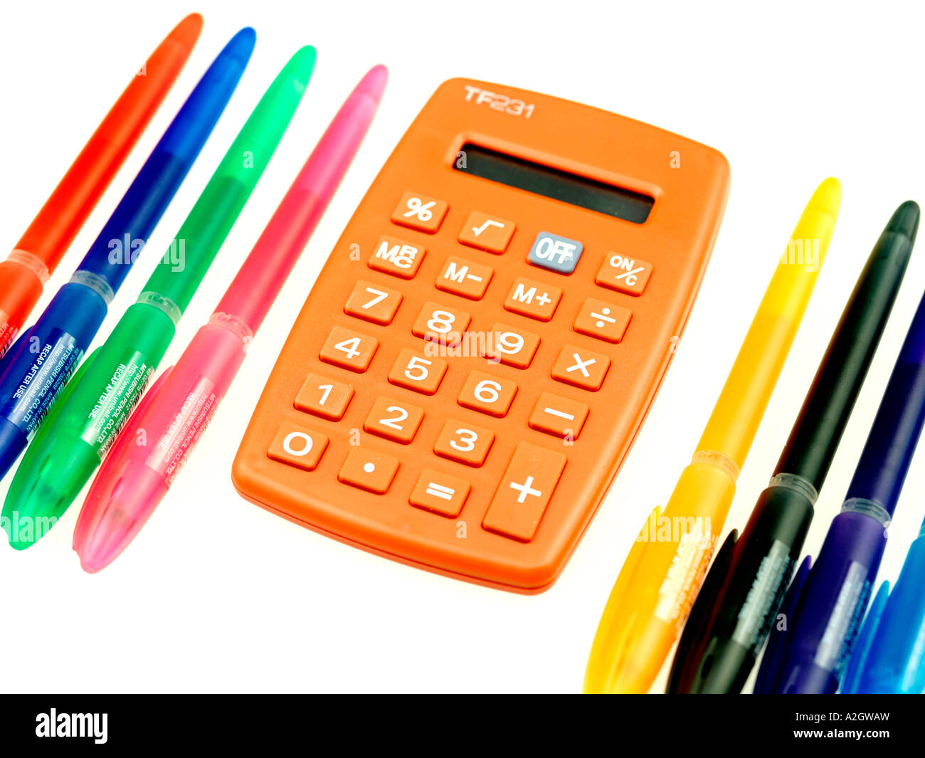 Orange Calculator and Pens Stock Photo - Alamy