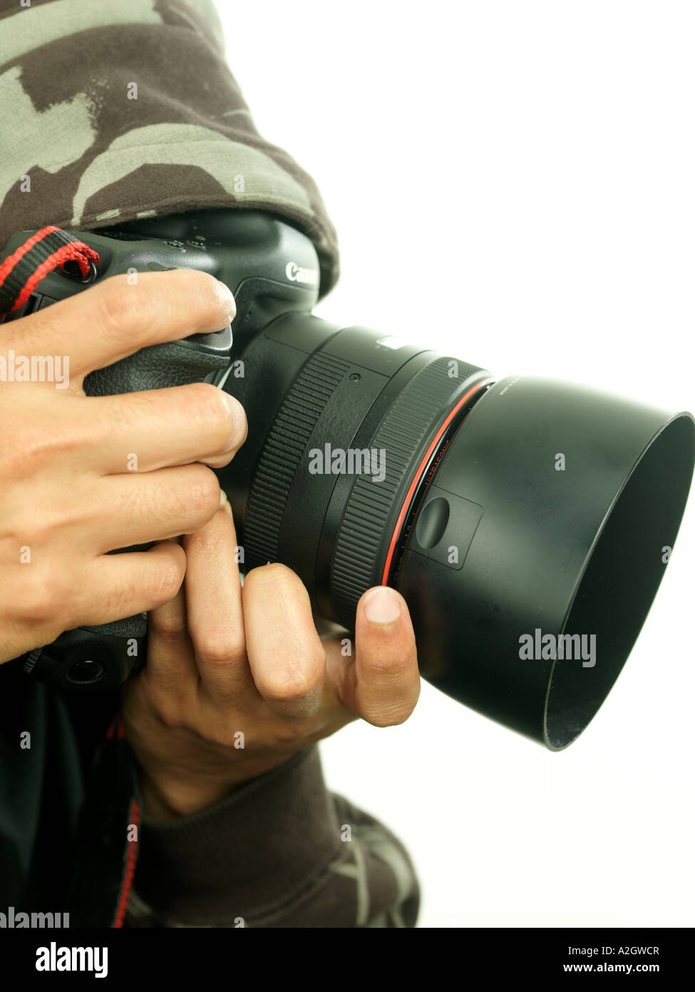 Young Man using Camera Model Released Stock Photo - Alamy