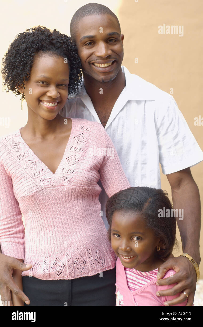 African parents with young daughter smiling Stock Photo - Alamy
