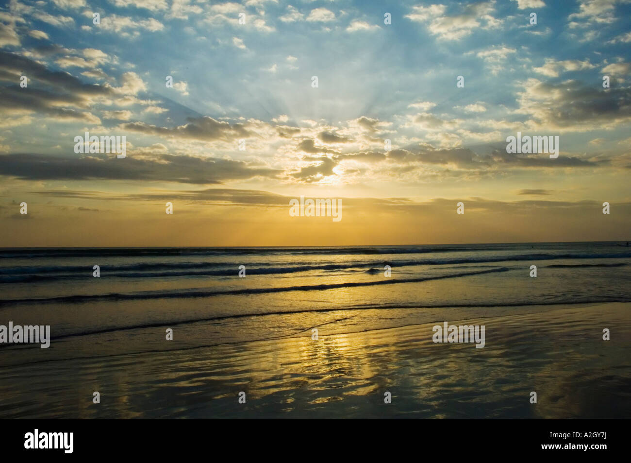 Indonesia Bali Kuta Beach sunset with clouds Stock Photo - Alamy