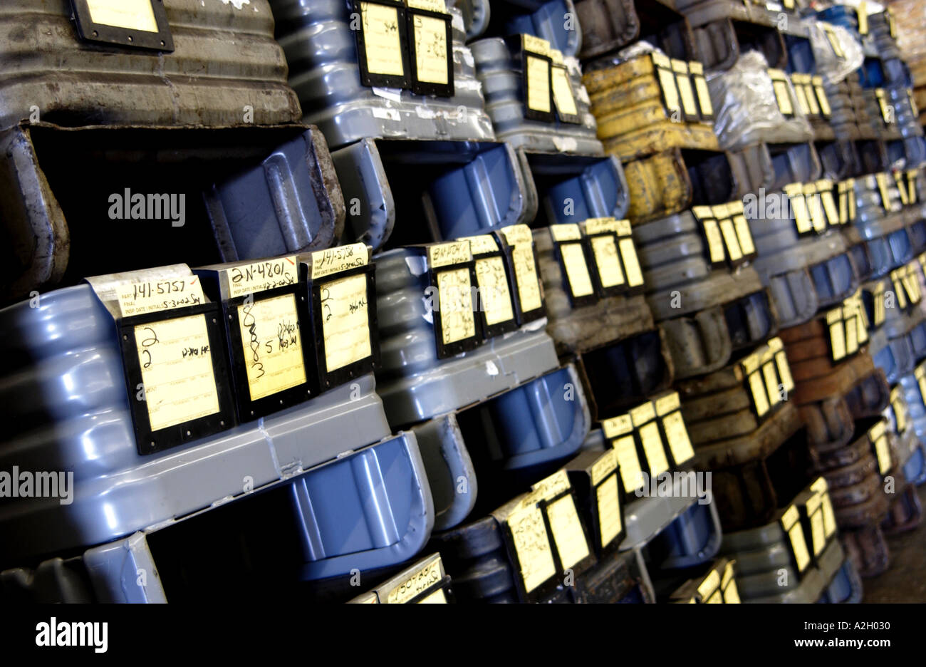 Parts bins in factory Stock Photo - Alamy