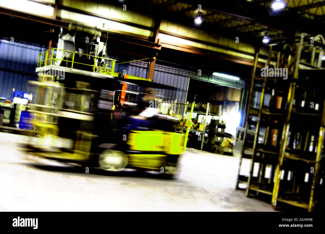Forklift moving in factory Stock Photo - Alamy