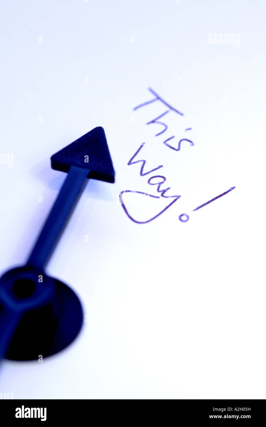 This Way direction arrow pointer sign Stock Photo - Alamy