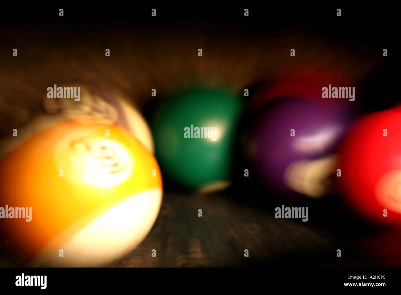 Blurred picture of Pool Balls in a pool table Stock Photo - Alamy