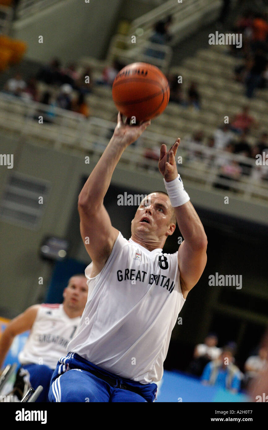 Simon Munn of Great Britain lines up a shot at basket in the bronze ...