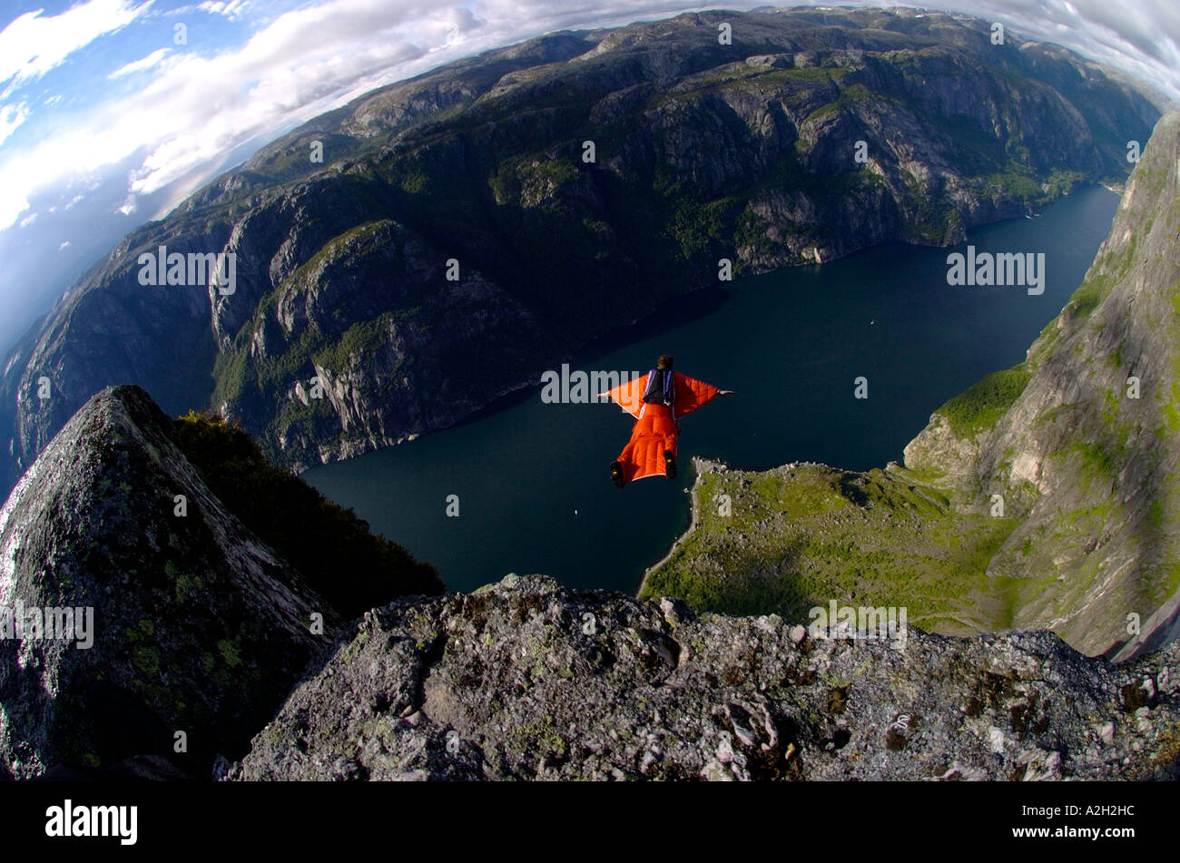 Base jumping kjerag norway cliff fjord extreme sport hi-res stock ...