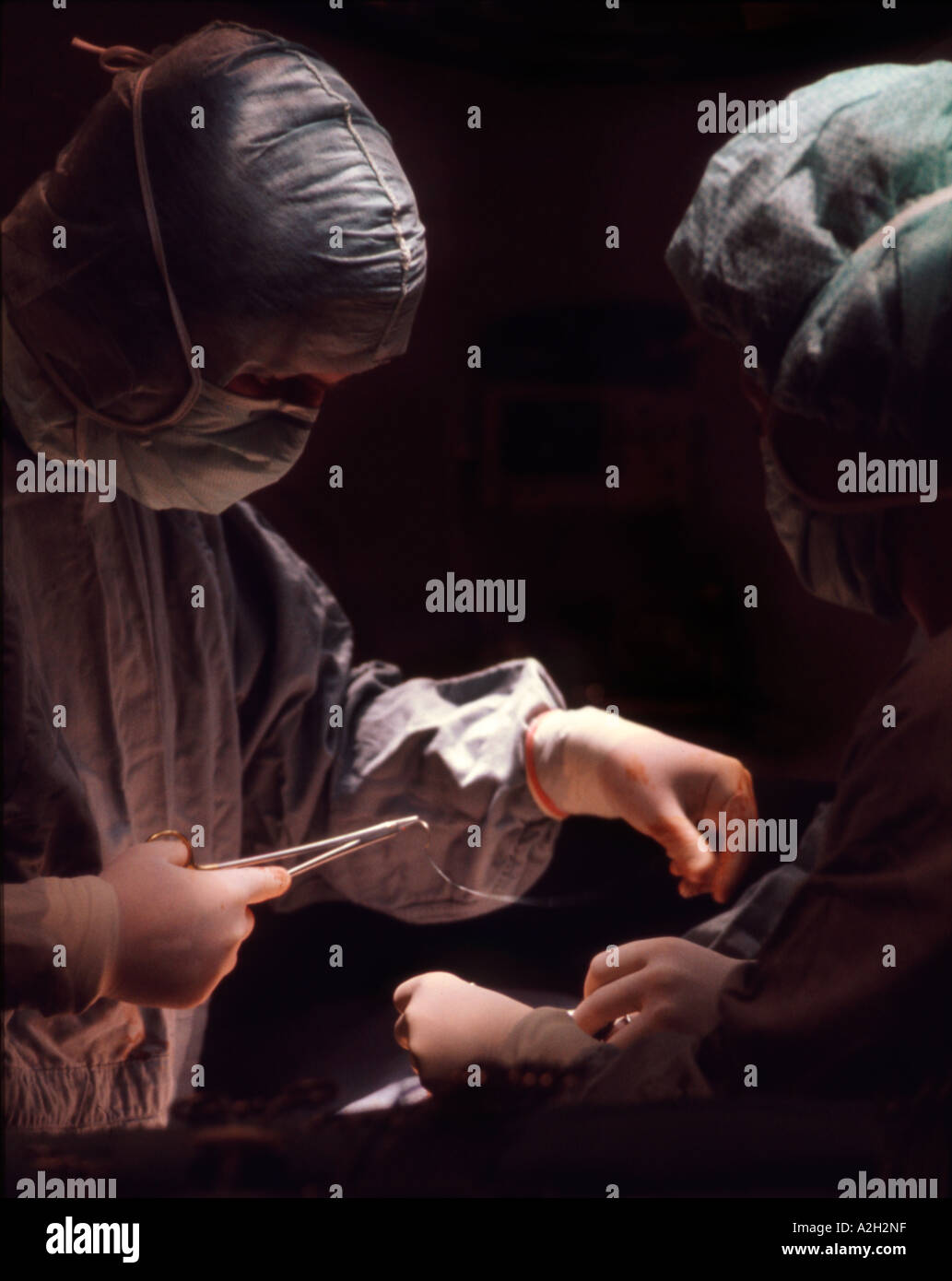 A hospital surgeon prepares to suture Stock Photo - Alamy