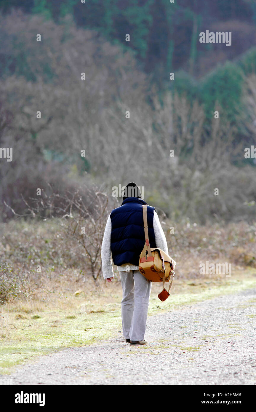 Man walking away from camera Stock Photo - Alamy