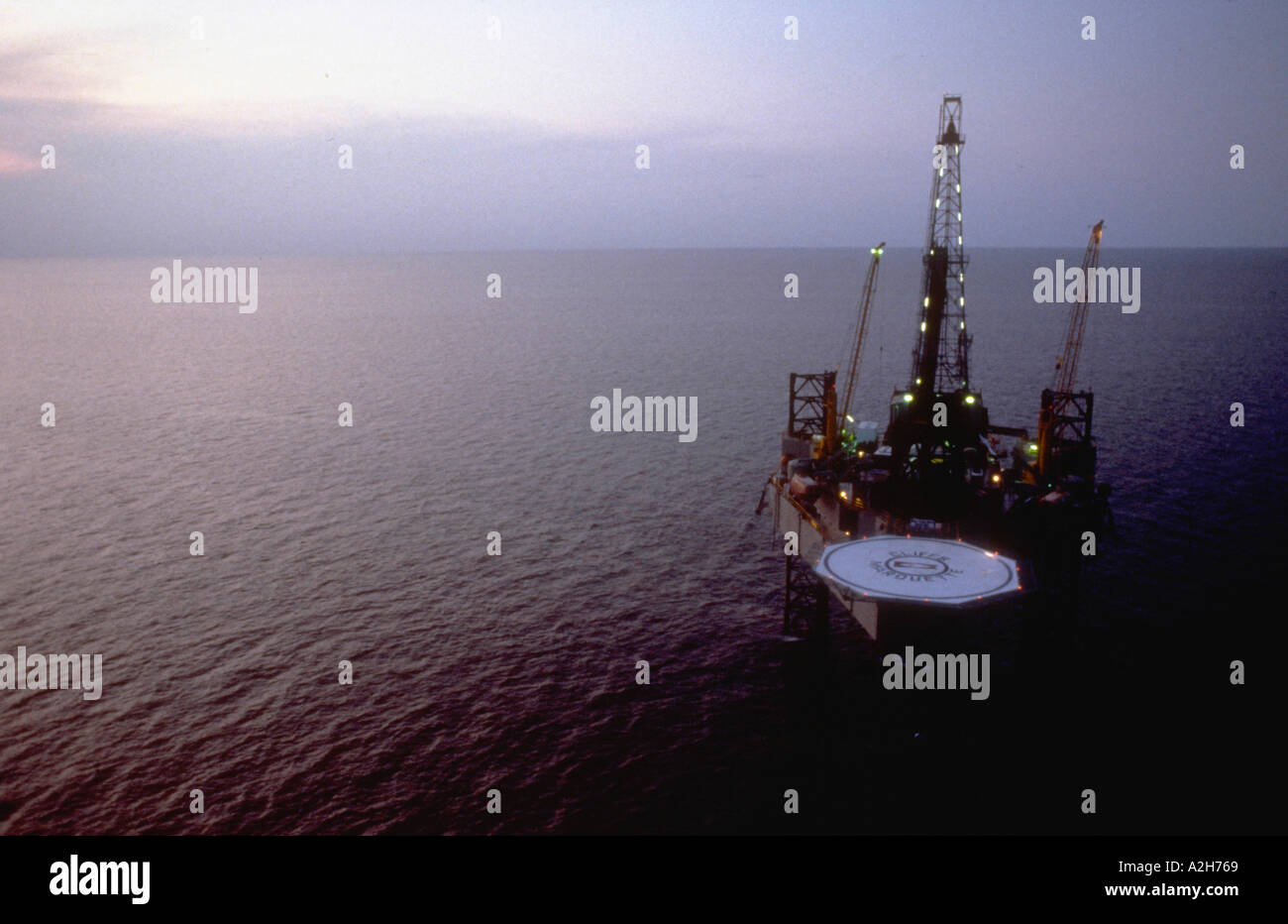 Aerial view of offshore jack up oil drilling rig at dawn Stock Photo ...