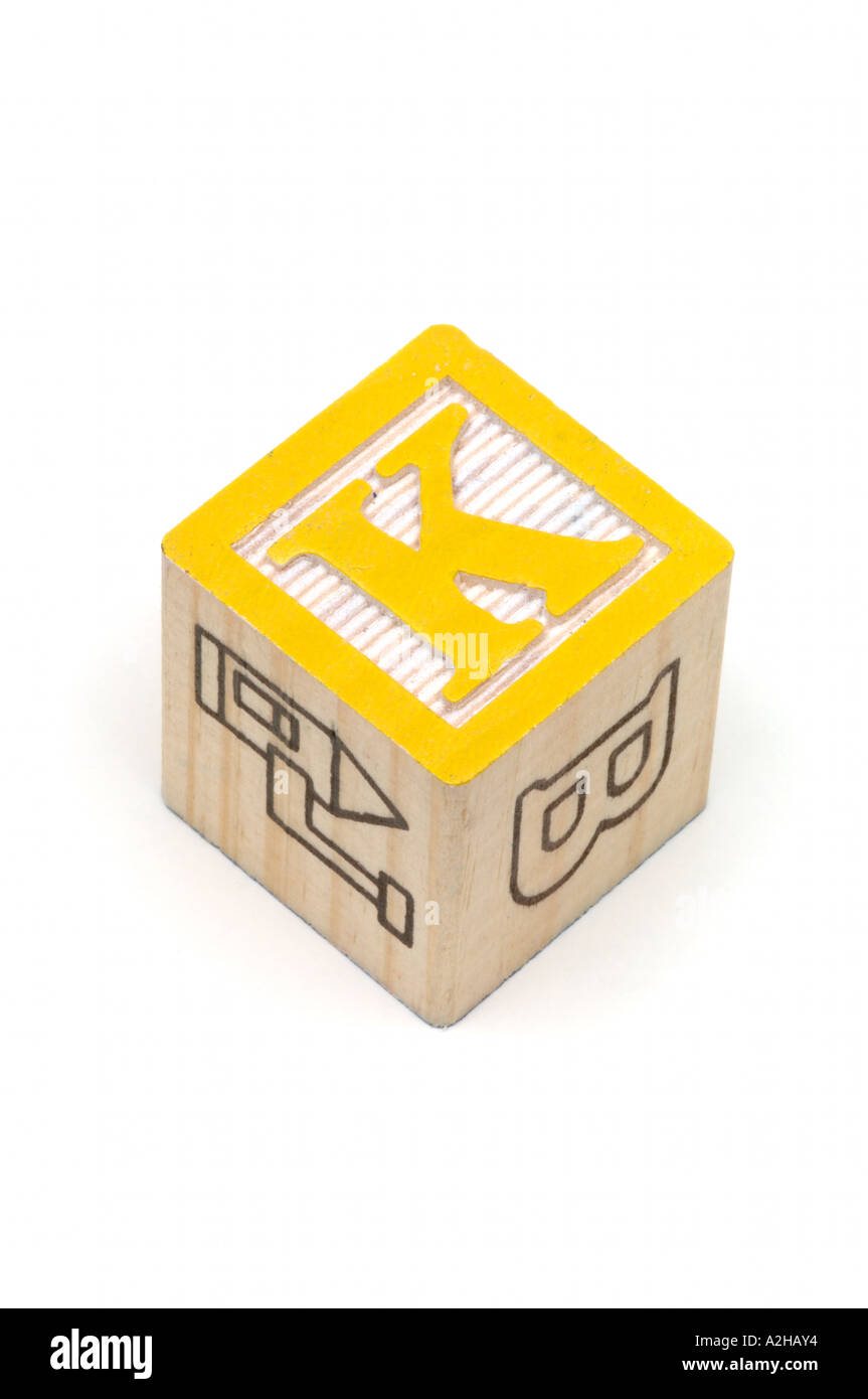Children wooden learning block showing yellow alphabet K Stock Photo ...