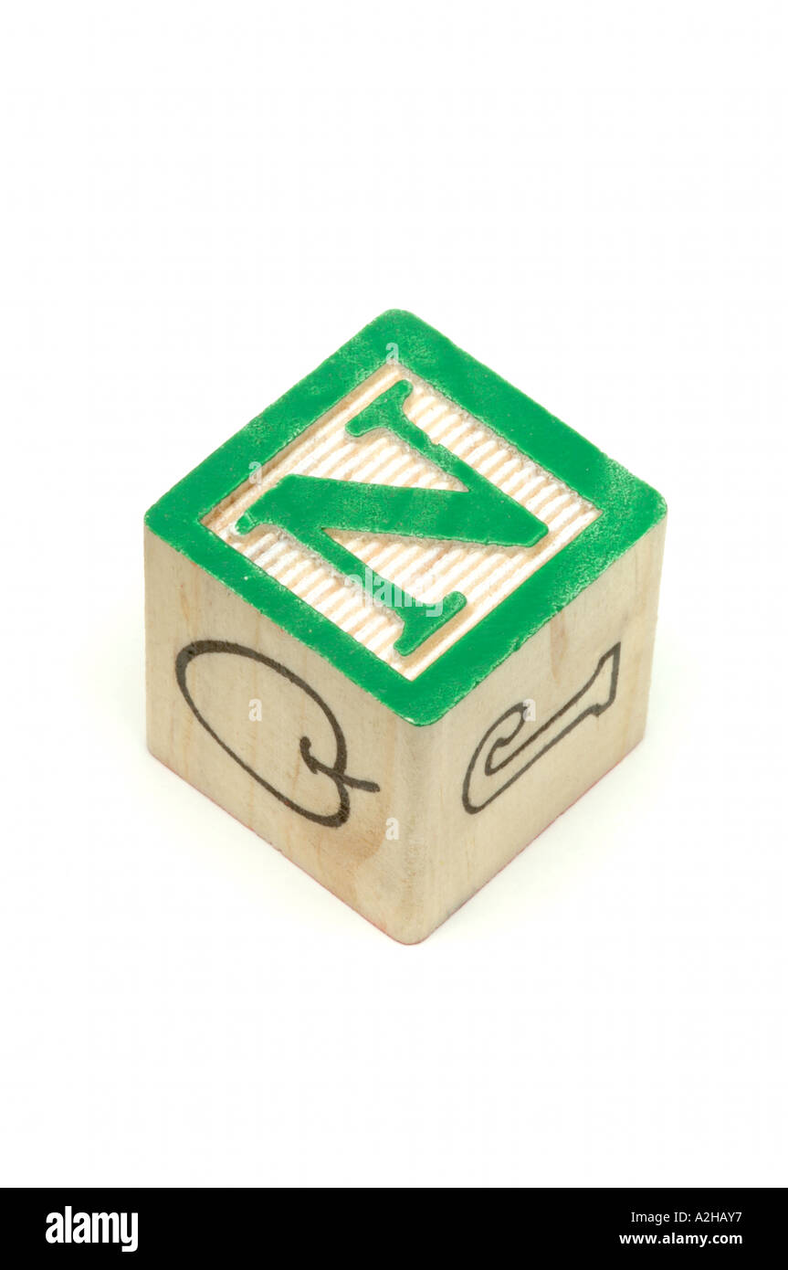 Children wooden learning block showing green alphabet N Stock Photo - Alamy