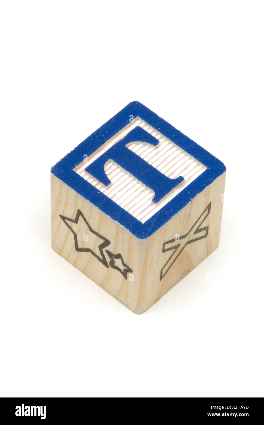 Children wooden learning block showing blue alphabet T Stock Photo - Alamy
