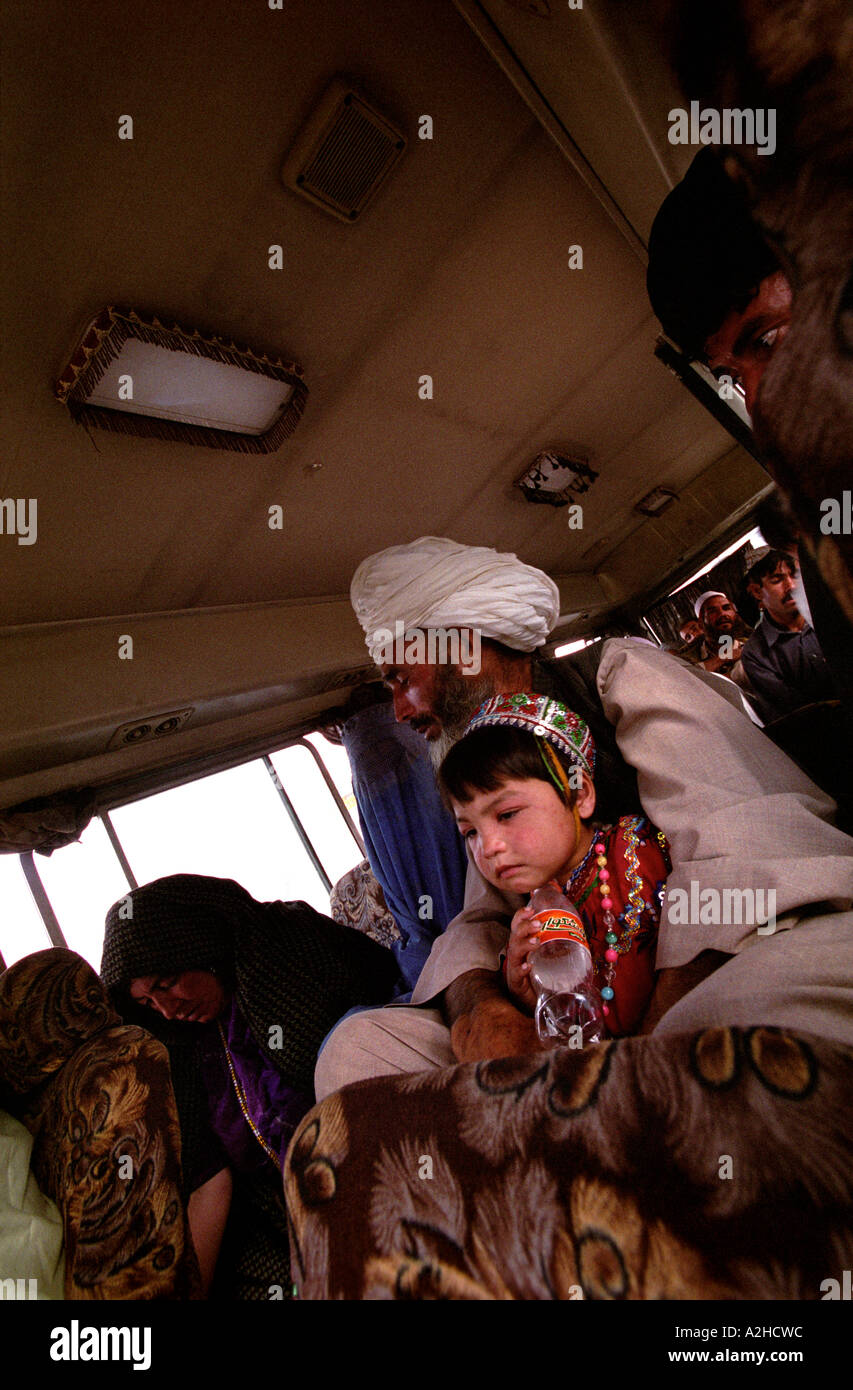 Kandahar-Kabul's Bus. An Afghan, wearing a white turban, travelling ...