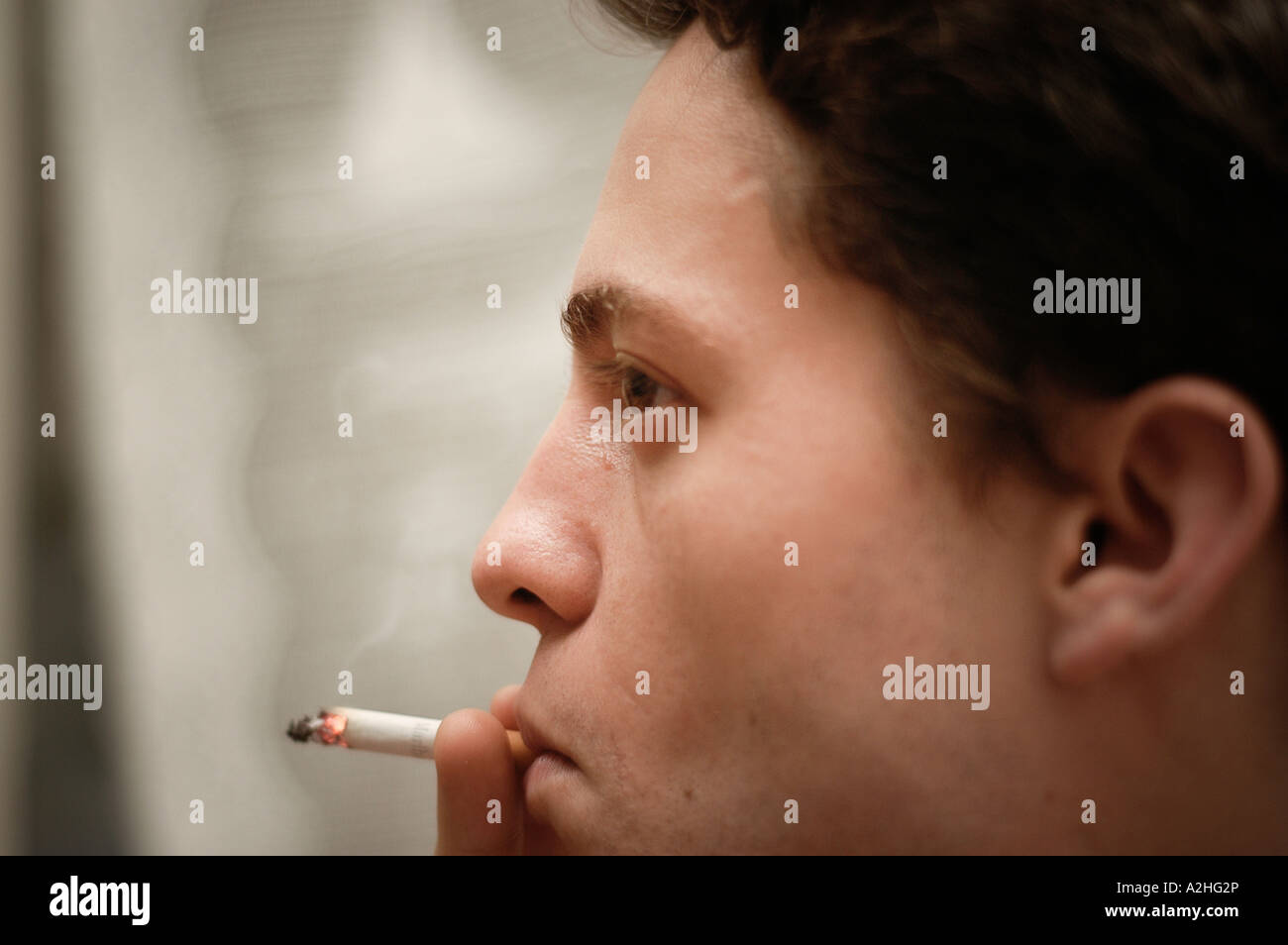 Curly hair man smoke hi-res stock photography and images - Alamy