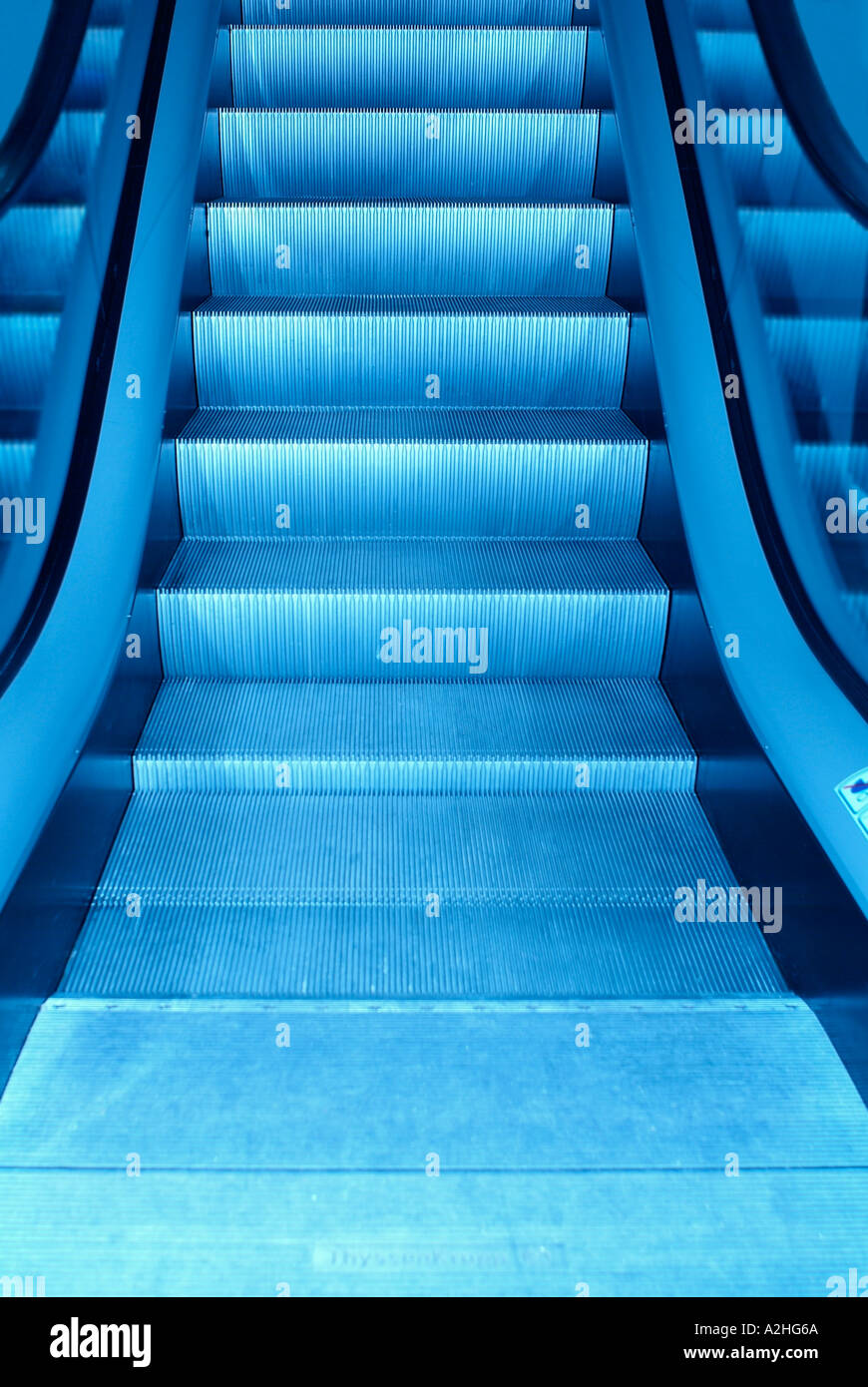 Moving up in escalator hi-res stock photography and images - Alamy