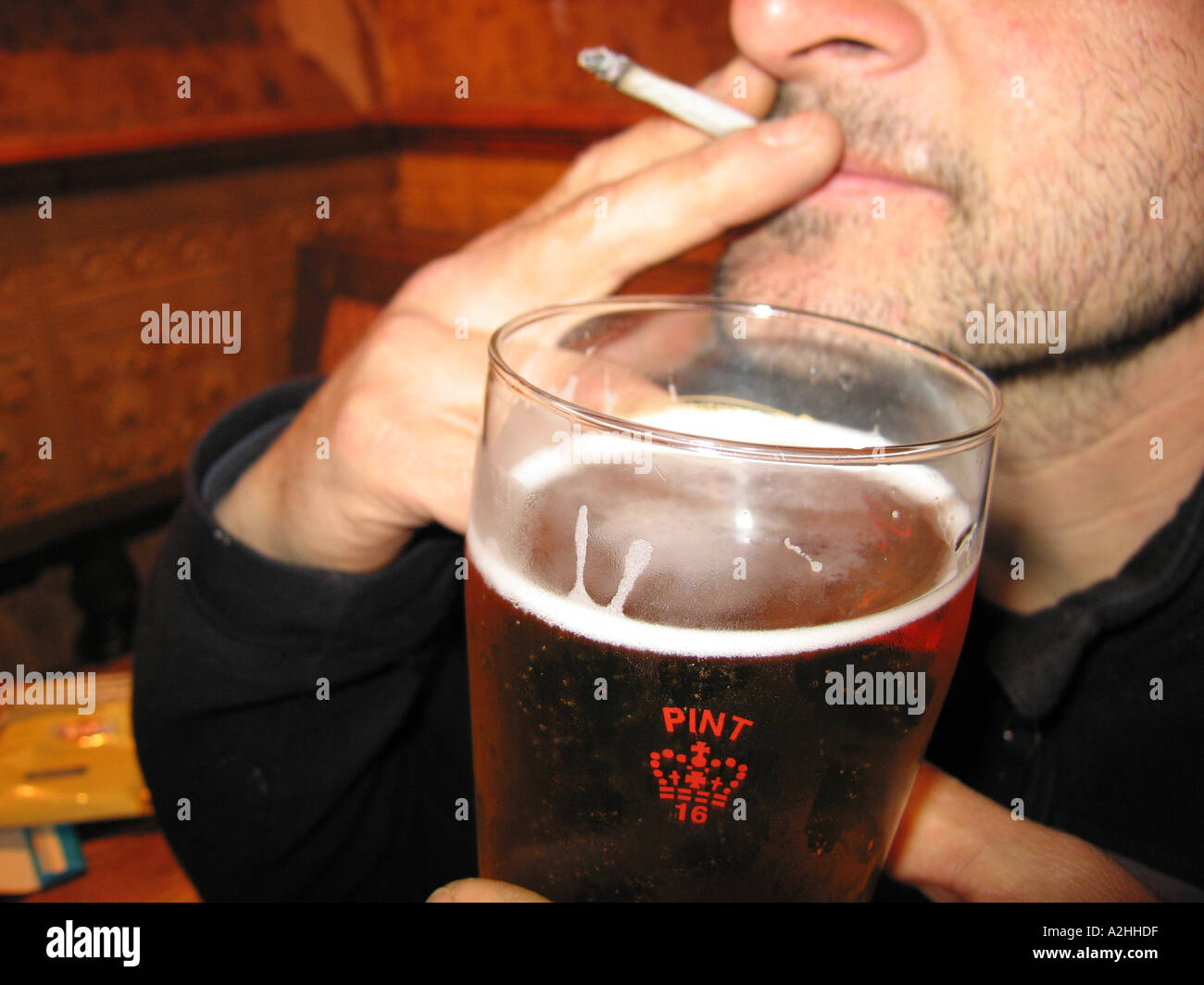 smoking roll up tobacco bath u k Stock Photo - Alamy