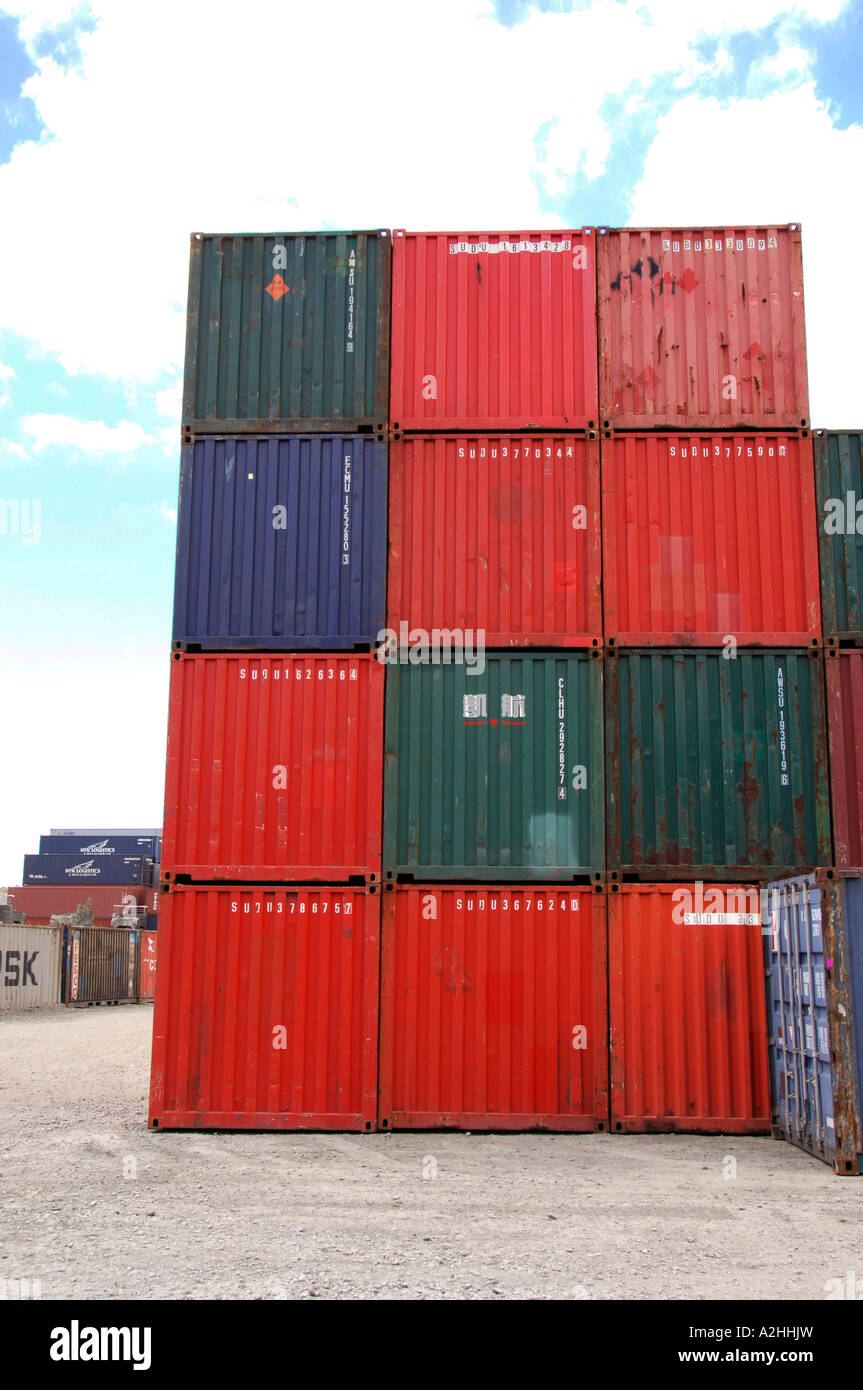 stacks of red and blue shipping containers Stock Photo - Alamy