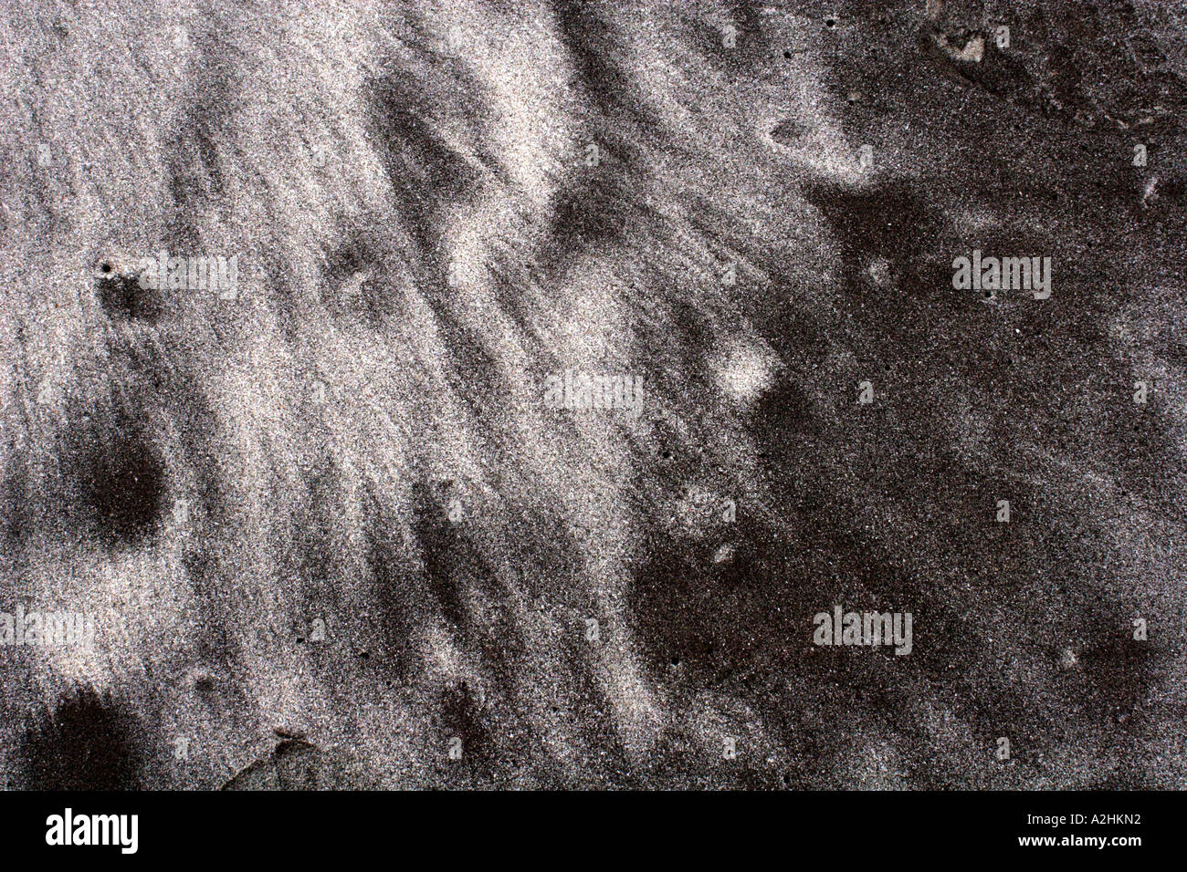 Natural abstract pattern in sand on strandline, Refviksanden beach ...
