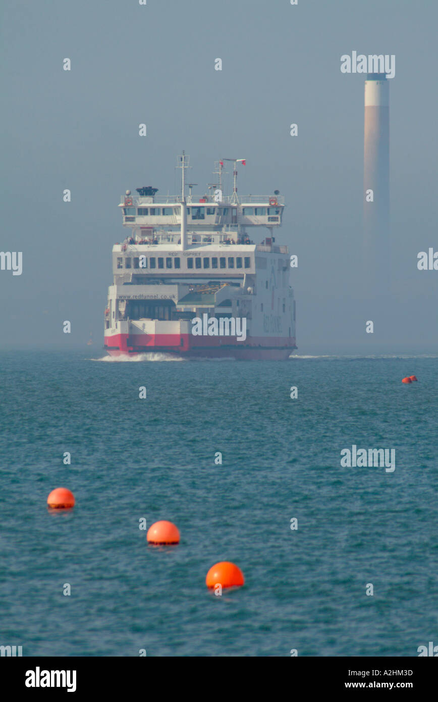 Red Funnel ferry Red Osprey emerges from a fog bank into the spring ...