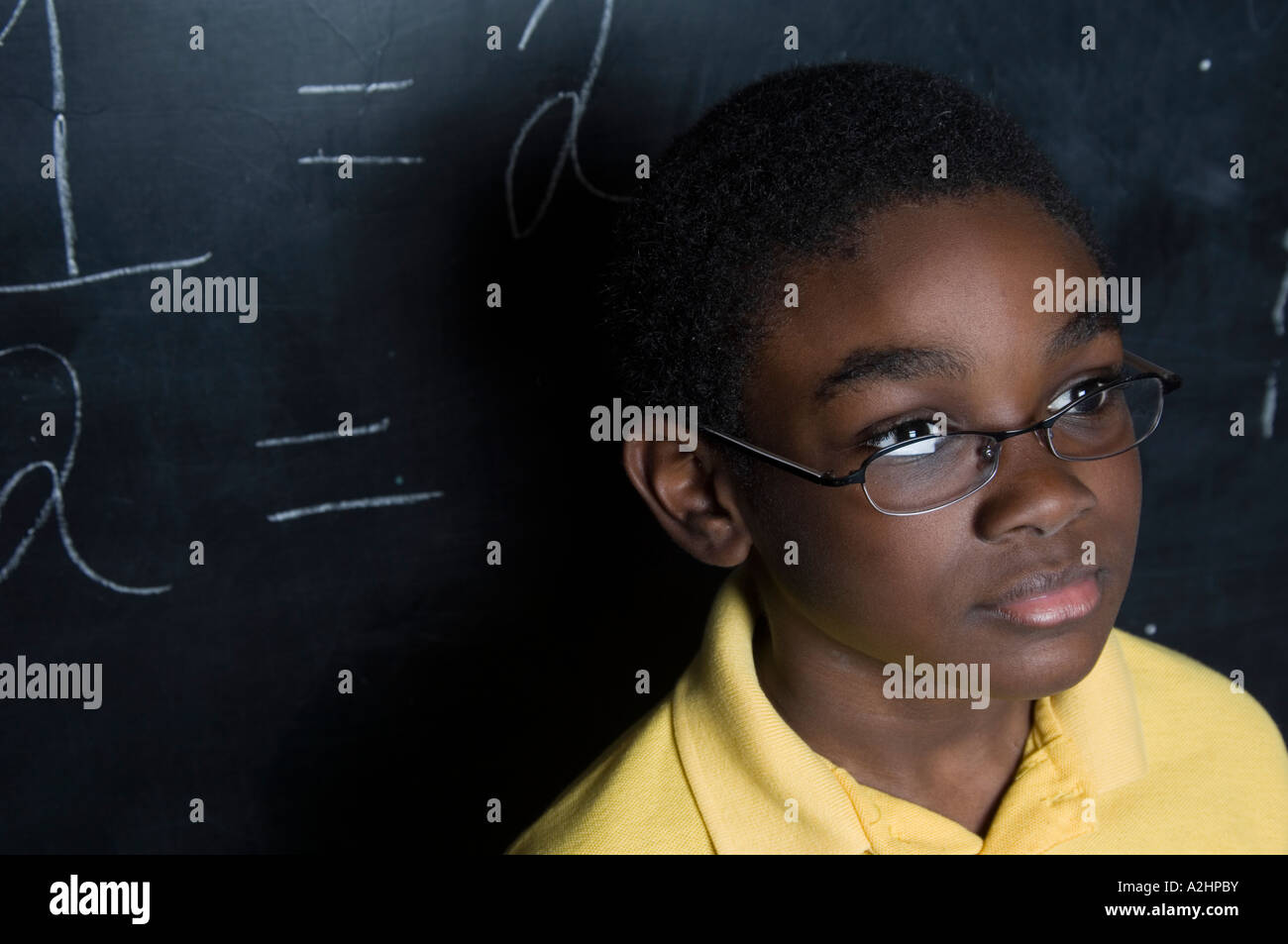 Smart kid in classroom Stock Photo - Alamy