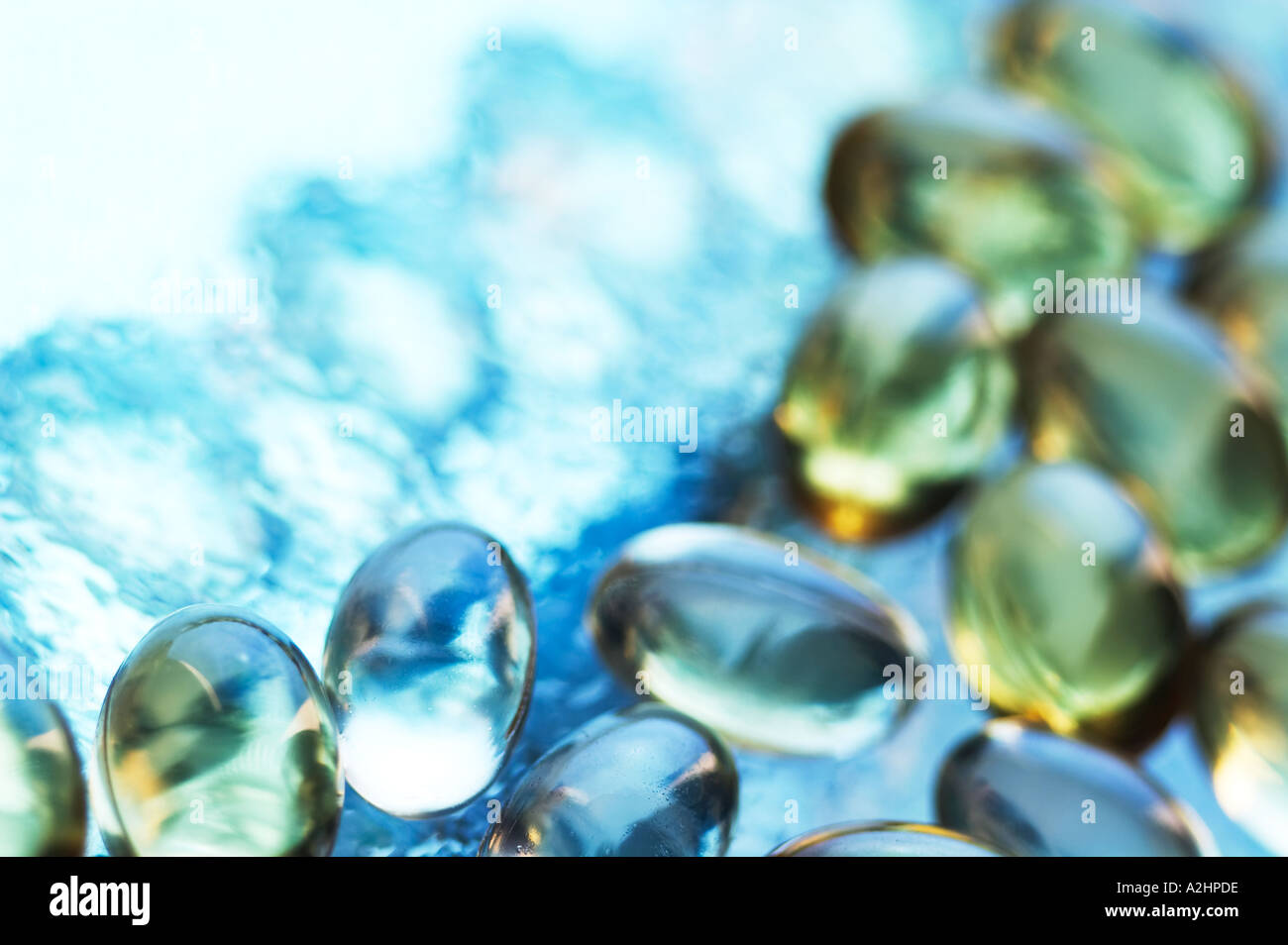 Landscape shot of star flower and cod liver oil capsules arranged on ...
