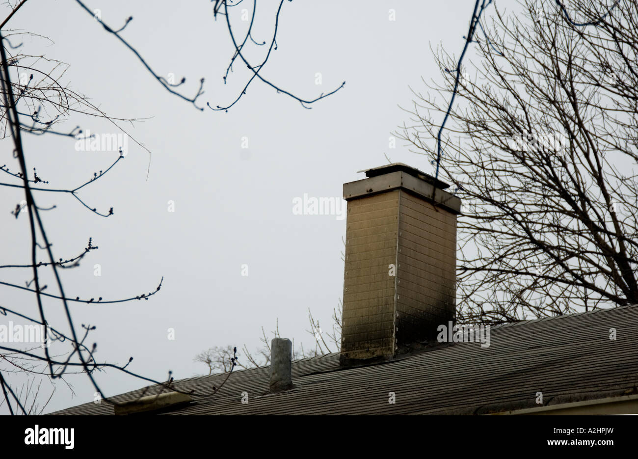 Chimney in winter Stock Photo - Alamy