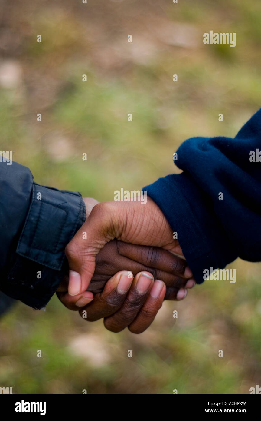 Kids shaking hands hi-res stock photography and images - Alamy