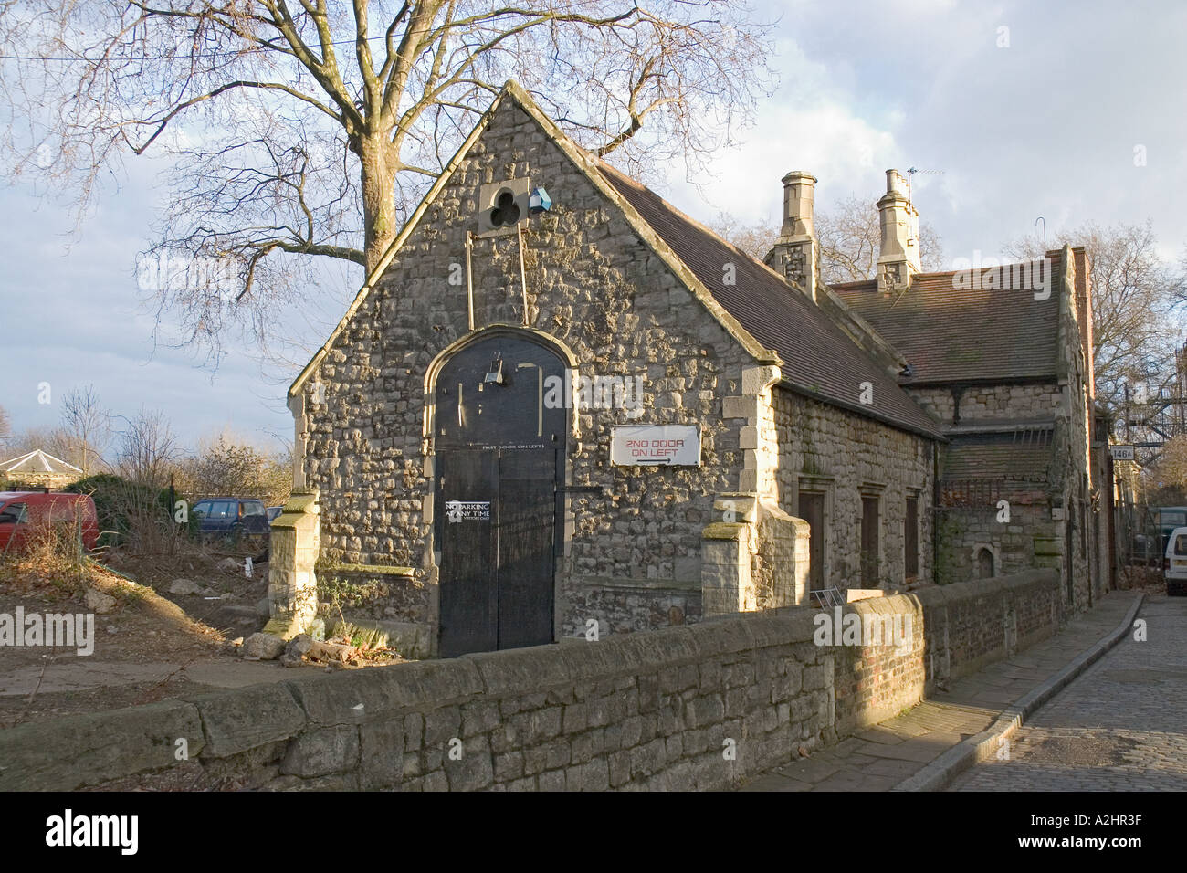 Old stone Victorian Schoolhouse in Hackney London UK Stock Photo - Alamy