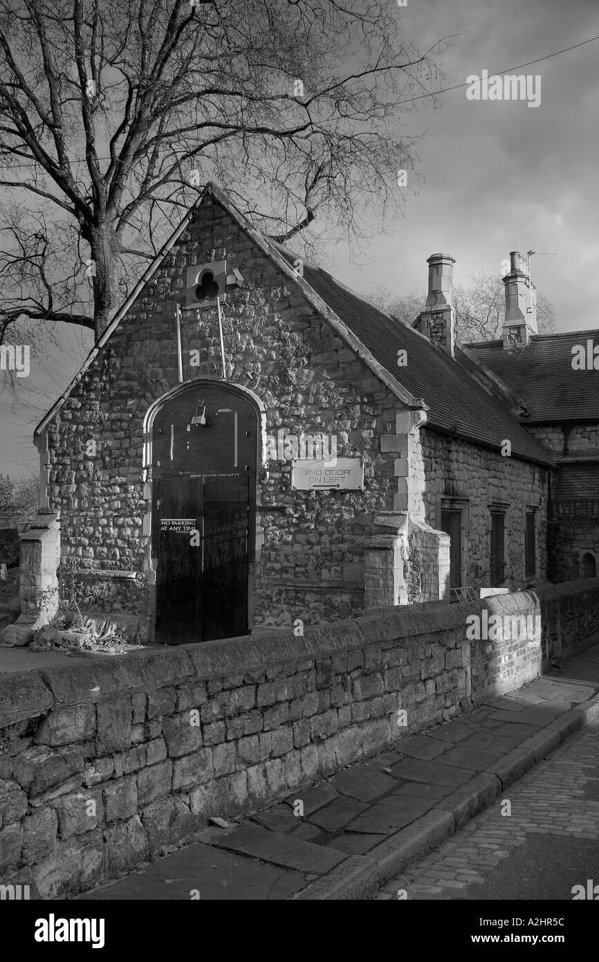 Old stone Victorian Schoolhouse in Hackney London UK Black and White ...