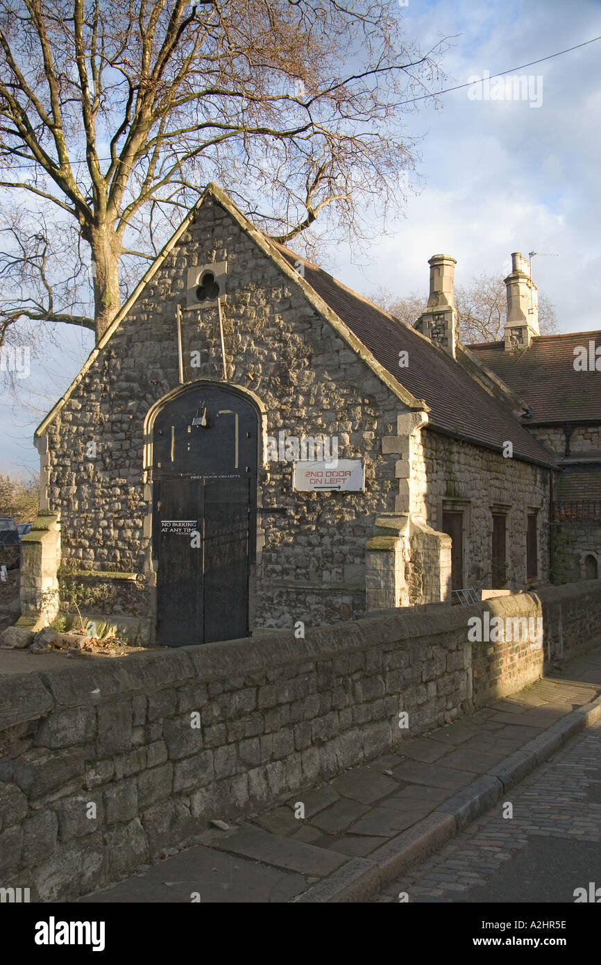 Old stone Victorian Schoolhouse in Hackney London UK Stock Photo - Alamy