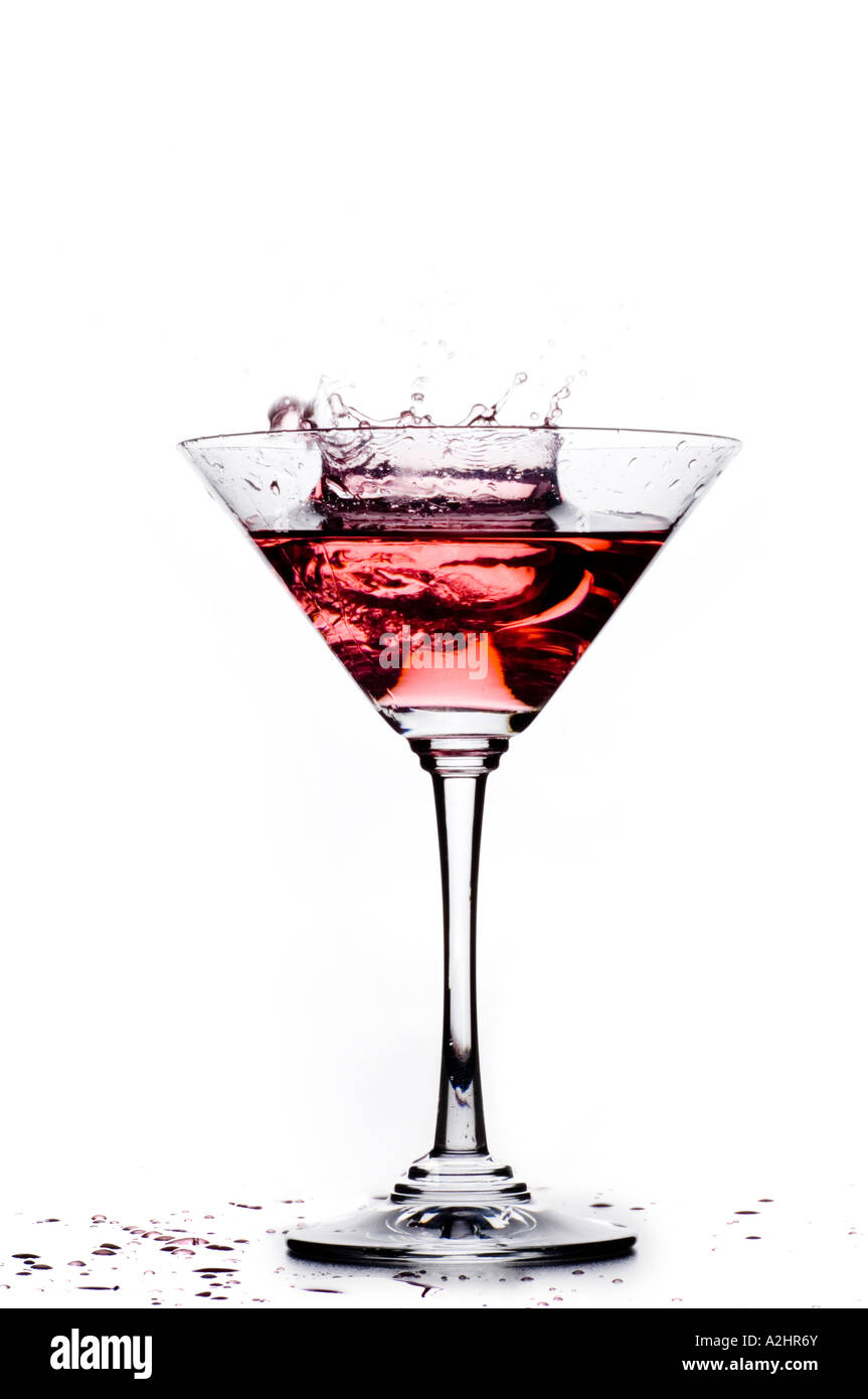 Splash in a Martini glass Stock Photo - Alamy