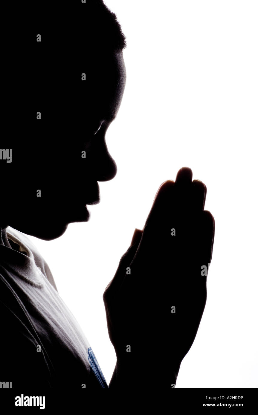 African american boy praying hi-res stock photography and images - Alamy