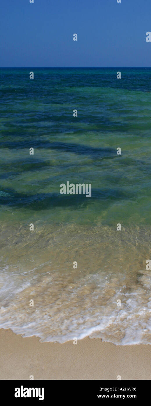 Wave washing onto beach hi-res stock photography and images - Alamy