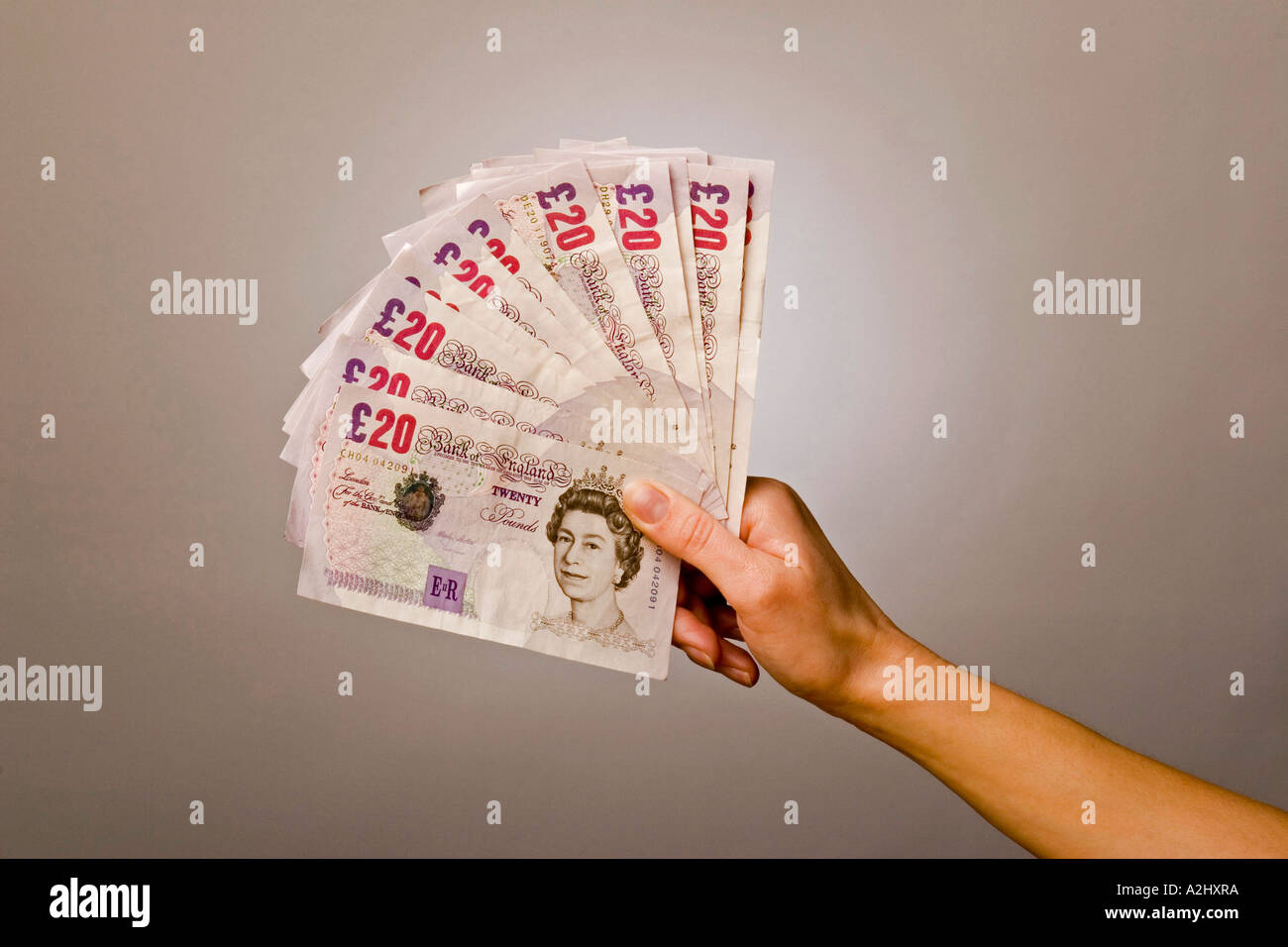 Fan of notes hand uk hi-res stock photography and images - Alamy