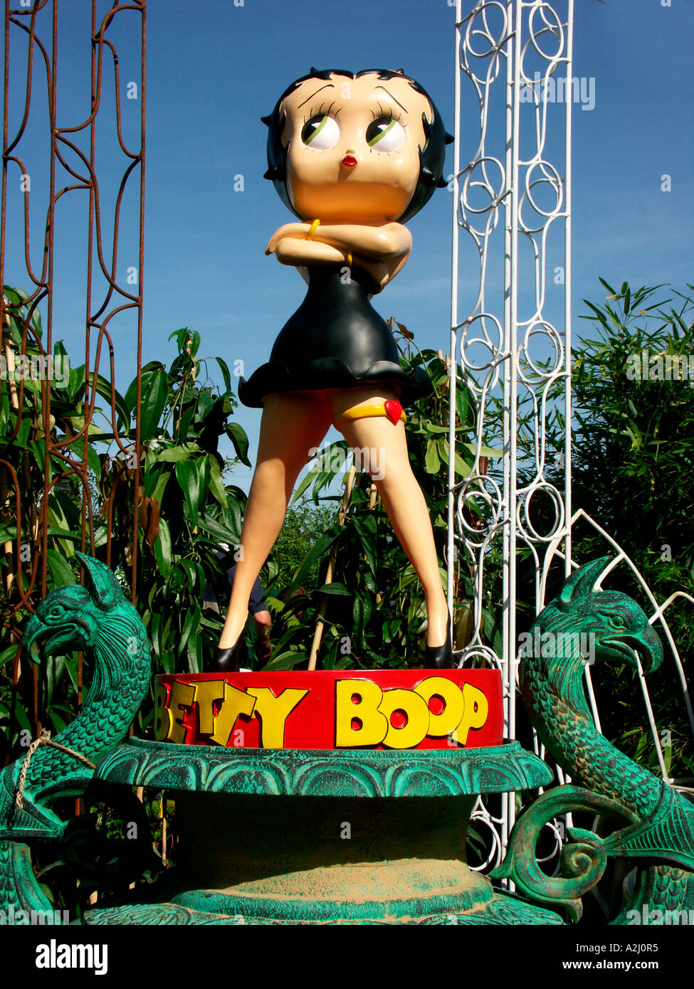 A stall selling outdoor garden ornaments including betty boo statue at ...