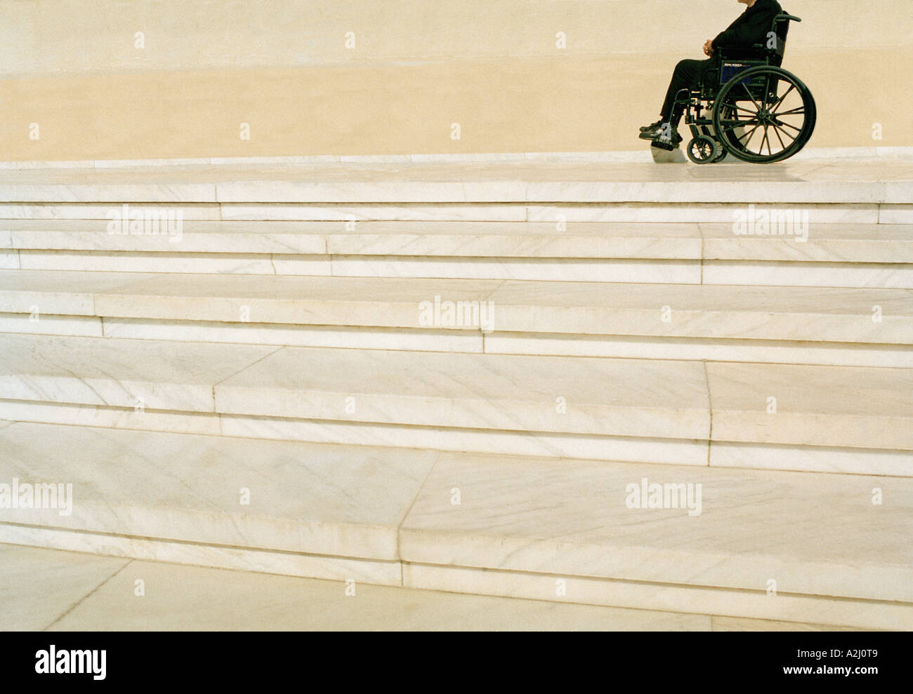 Disabled man in a wheelchair at the top a flight of stone steps Stock ...